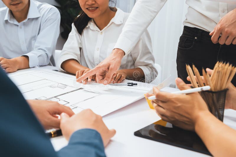 Diverse Group of Civil Engineer and Client Working on Architect ...