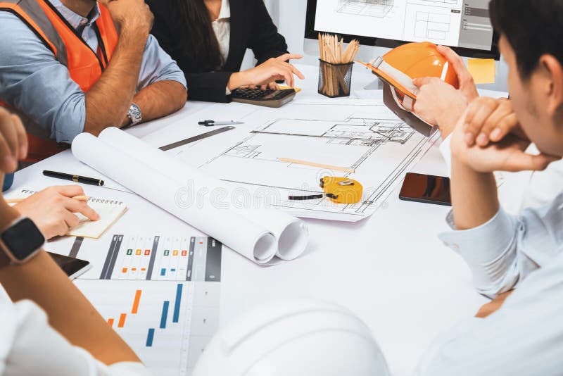 Diverse Group of Civil Engineer and Client Working on Architect ...