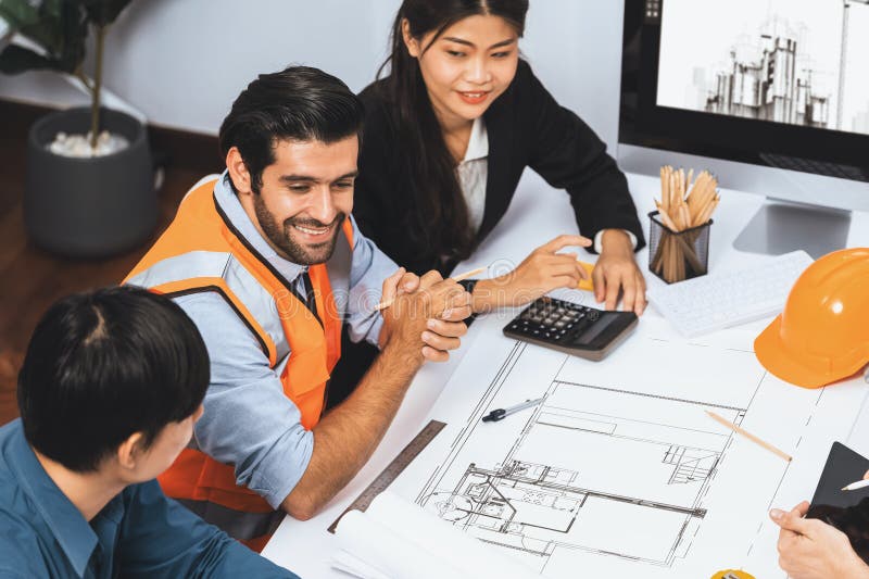 Diverse Group of Civil Engineer and Client Working on Architect ...