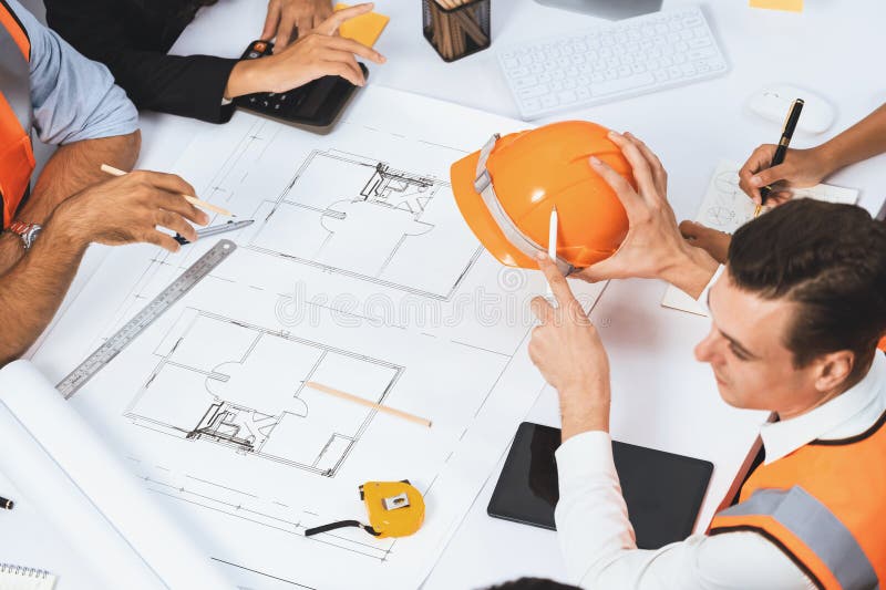 Diverse Group of Civil Engineer and Client Working on Architect ...