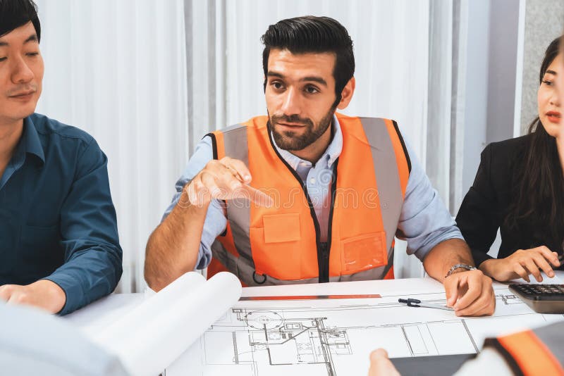 Diverse Group of Civil Engineer and Client Working on Architect ...