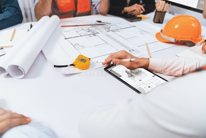 Diverse Group of Civil Engineer and Client Working on Architect ...