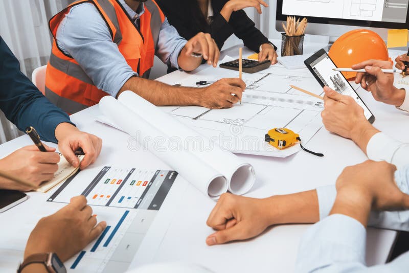 Diverse Group of Civil Engineer and Client Working on Architect ...
