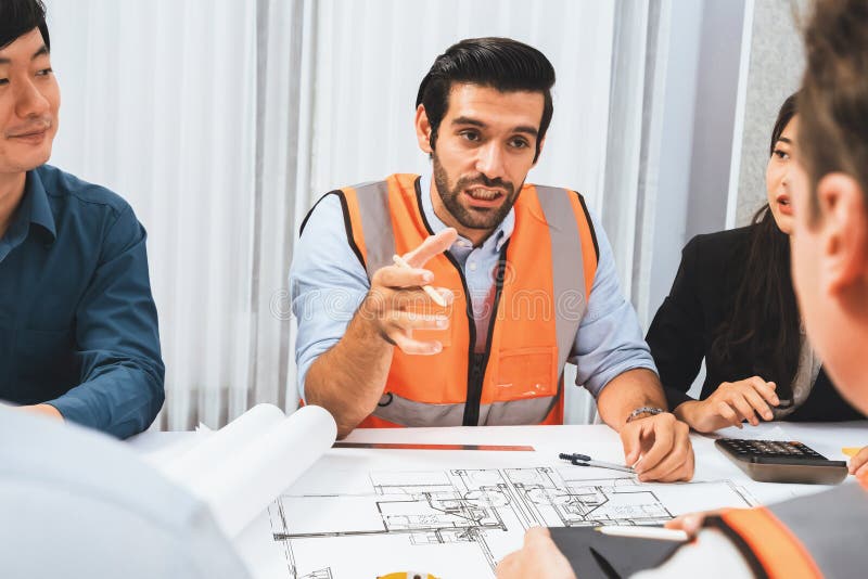 Diverse Group of Civil Engineer and Client Working on Architect ...