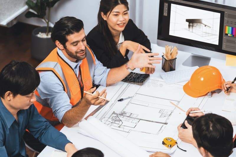 Diverse Group of Civil Engineer and Client Working on Architect ...