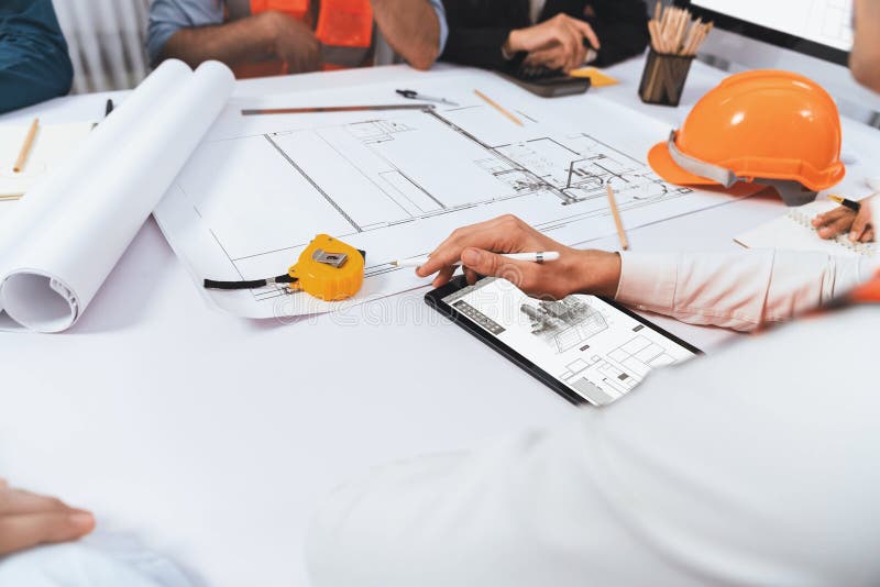 Diverse Group of Civil Engineer and Client Working on Architect ...