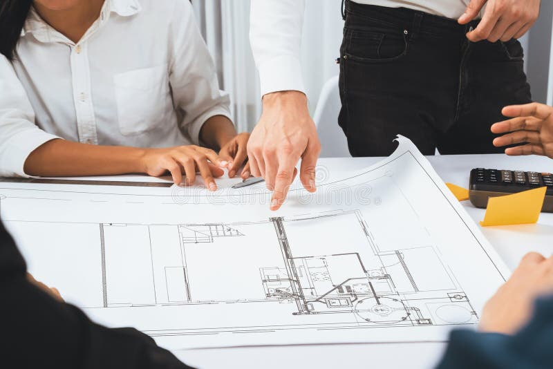 Diverse Group of Civil Engineer and Client Working on Architect ...