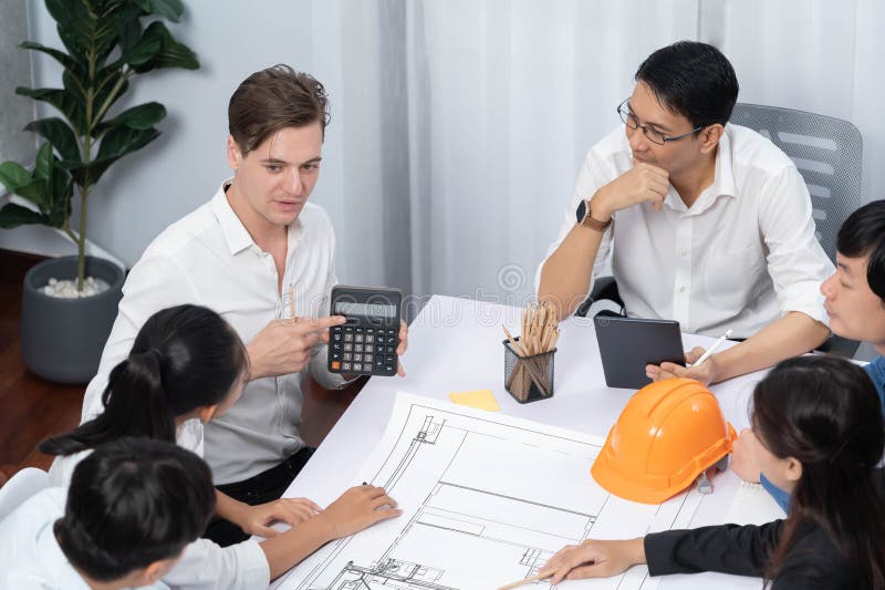 Diverse Group of Civil Engineer and Client Working on Architect ...