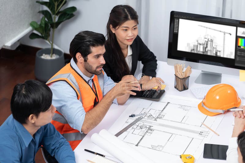 Diverse Group of Civil Engineer and Client Working on Architect ...