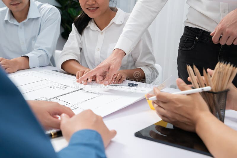 Diverse Group of Civil Engineer and Client Working on Architect ...