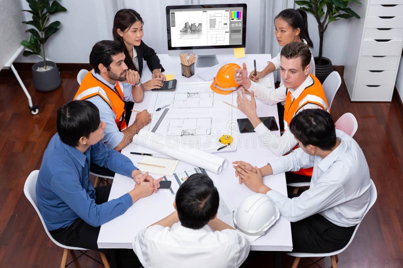 Diverse Group of Civil Engineer and Client Working on Architect ...