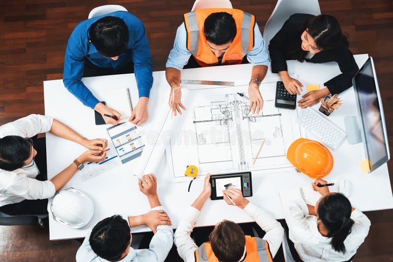 Diverse Group of Civil Engineer and Client Working on Architect ...