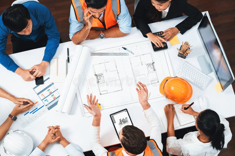 Diverse Group of Civil Engineer and Client Working on Architect ...