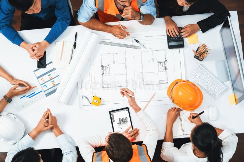 Diverse Group of Civil Engineer and Client Working on Architect ...