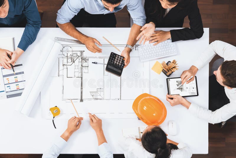 Diverse Group of Civil Engineer and Client Working on Architect ...