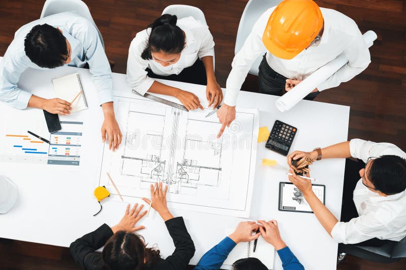 Diverse Group of Civil Engineer and Client Working on Architect ...