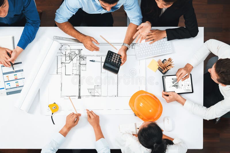 Diverse Group of Civil Engineer and Client Working on Architect ...