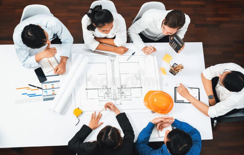 Diverse Group of Civil Engineer and Client Working on Architect ...