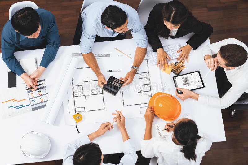 Diverse Group of Civil Engineer and Client Working on Architect ...