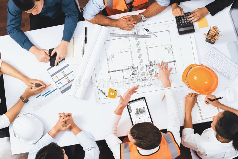 Diverse Group of Civil Engineer and Client Working on Architect ...