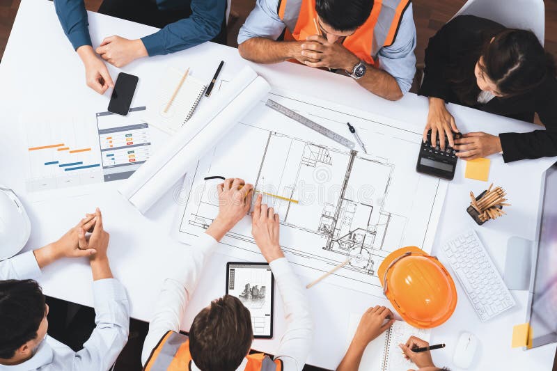 Diverse Group of Civil Engineer and Client Working on Architect ...