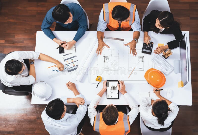 Diverse Group of Civil Engineer and Client Working on Architect ...