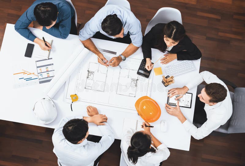 Diverse Group of Civil Engineer and Client Working on Architect ...