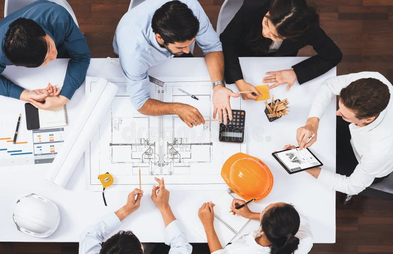 Diverse Group of Civil Engineer and Client Working on Architect ...