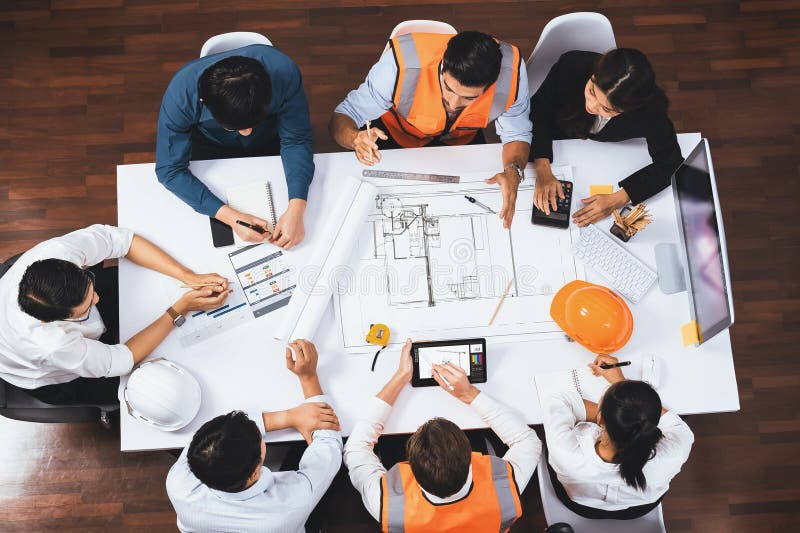 Diverse Group of Civil Engineer and Client Working on Architect ...