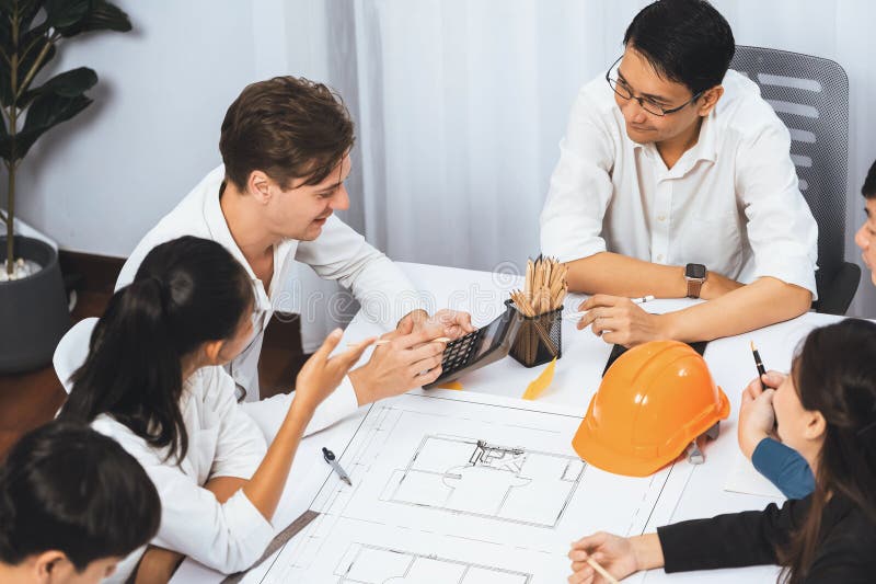 Diverse Group of Civil Engineer and Client Working on Architect ...