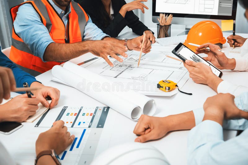 Diverse Group of Civil Engineer and Client Working on Architect ...