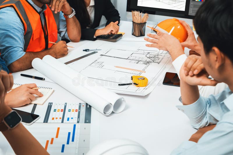 Diverse Group of Civil Engineer and Client Working on Architect ...