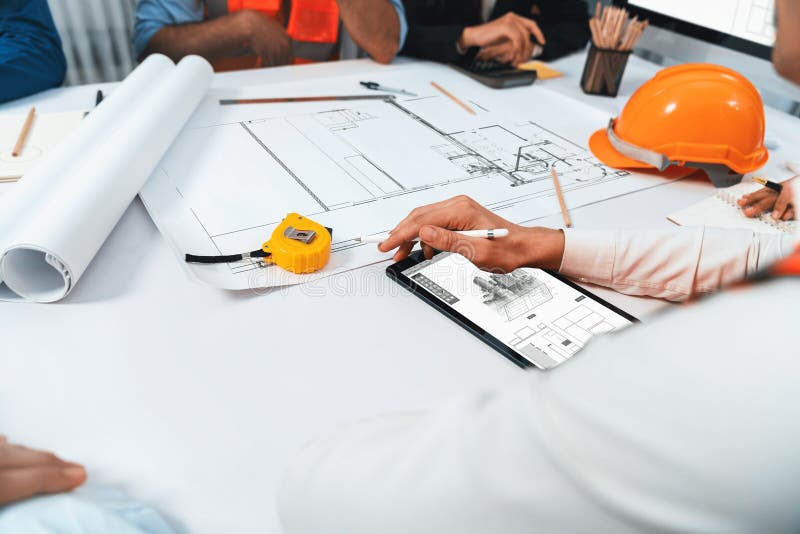 Diverse Group of Civil Engineer and Client Working on Architect ...