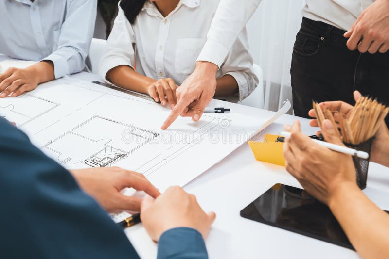 Diverse Group of Civil Engineer and Client Working on Architect ...