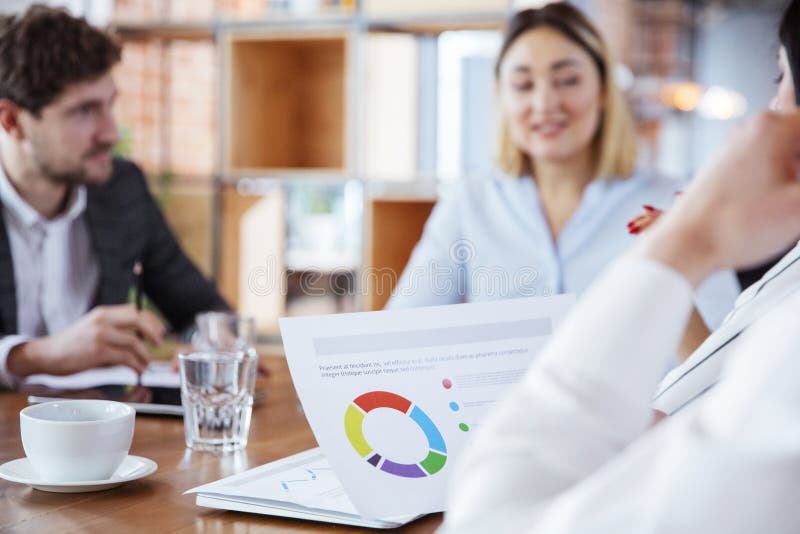 Diverse Group of Co-workers Having Casual Discussion in Office ...
