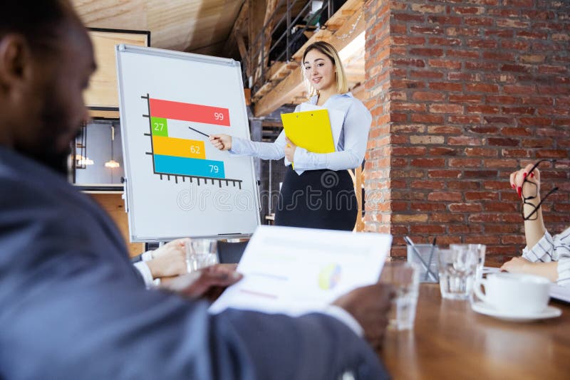 Diverse Group of Co-workers Having Casual Discussion in Office ...