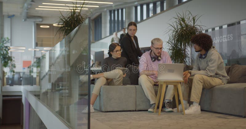 A Diverse Group of Colleagues Exchange Business Experiences, Engage in ...