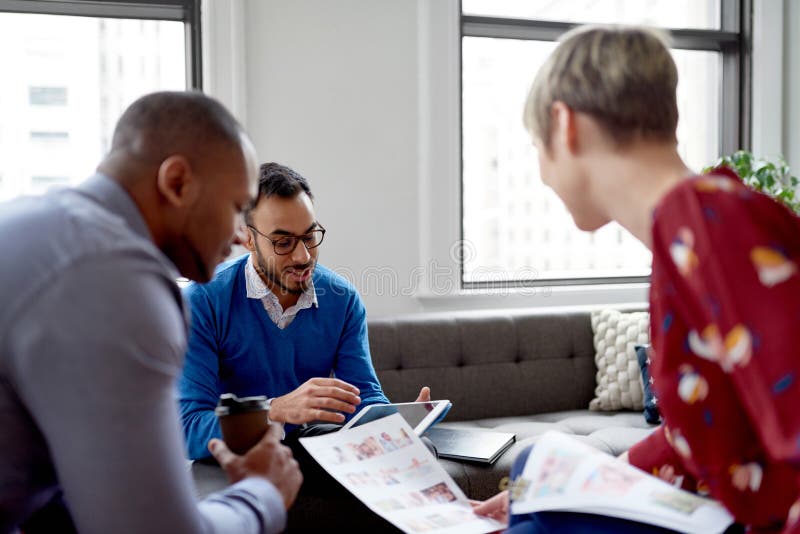 Multi-ethnic Team of Creative Millenials Collaborating on a Brainstorm ...