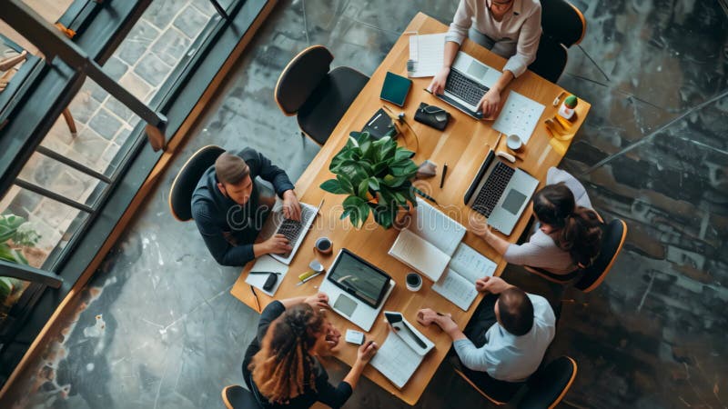 A Diverse Group of Four Individuals Collaborates on a Group Project ...