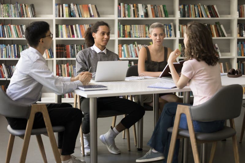 Diverse Group of Fresh Students Studying Together in University Campus ...