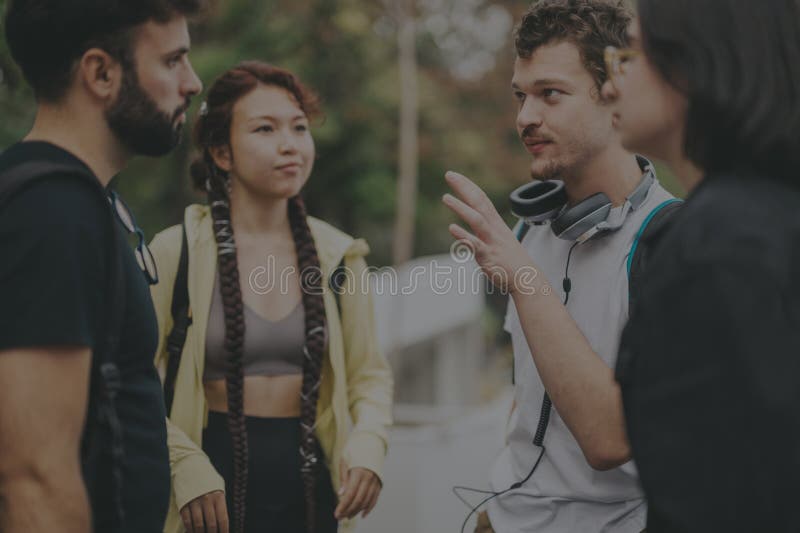 Group of Friends Having a Casual Outdoor Conversation Stock Photo ...
