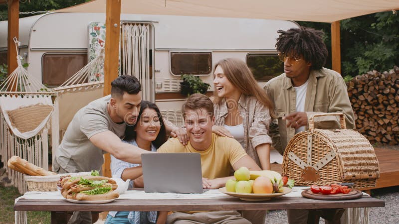 Friends Enjoying a Summer Weekend Outdoors while Camping and Sharing ...