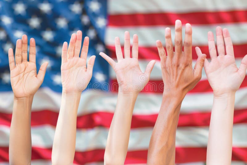 A Diverse Group of Hands Raised High in Unison, with the American Flag ...