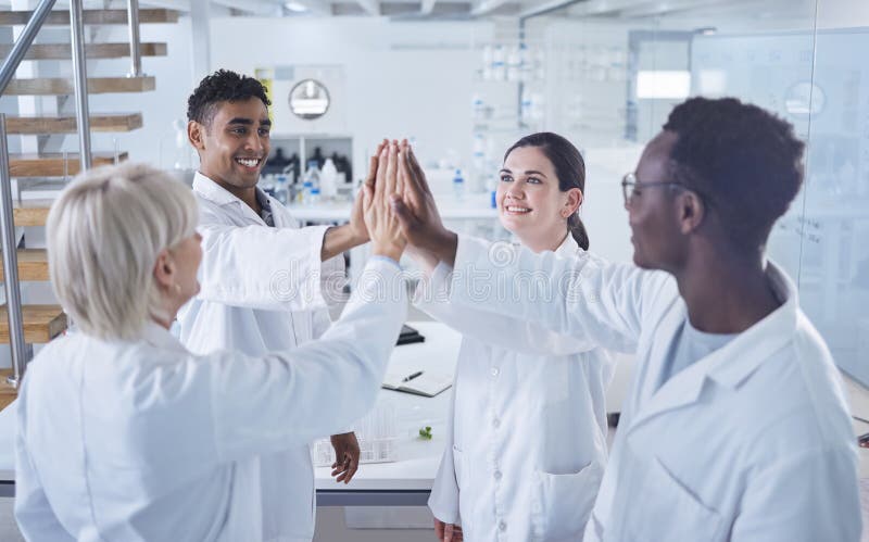Diverse Group of Happy Scientists Giving Each Other a High Give To ... Diverse Group of Happy Scientists Giving Each Other a High Give To ...