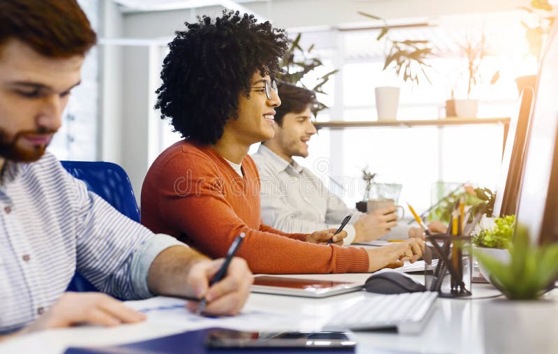 Group of Men Working at Desk with Computer Stock Photo - Image of ...