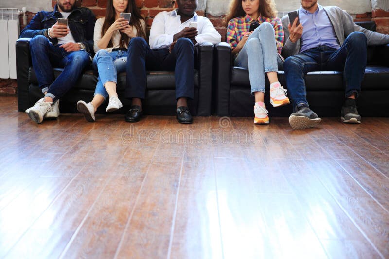 Diverse Group of People Community Togetherness Technology Sitting ...