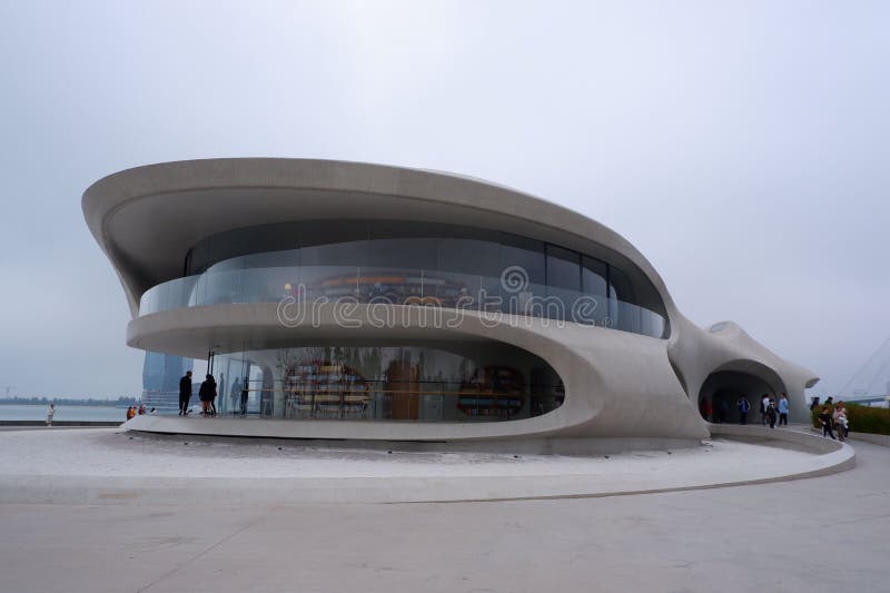 Diverse Group of People Standing in Front of the Wormhole Library in ...