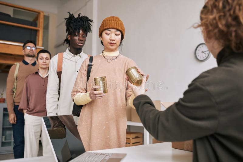 People Lining at Donations Center Stock Photo - Image of donating ...