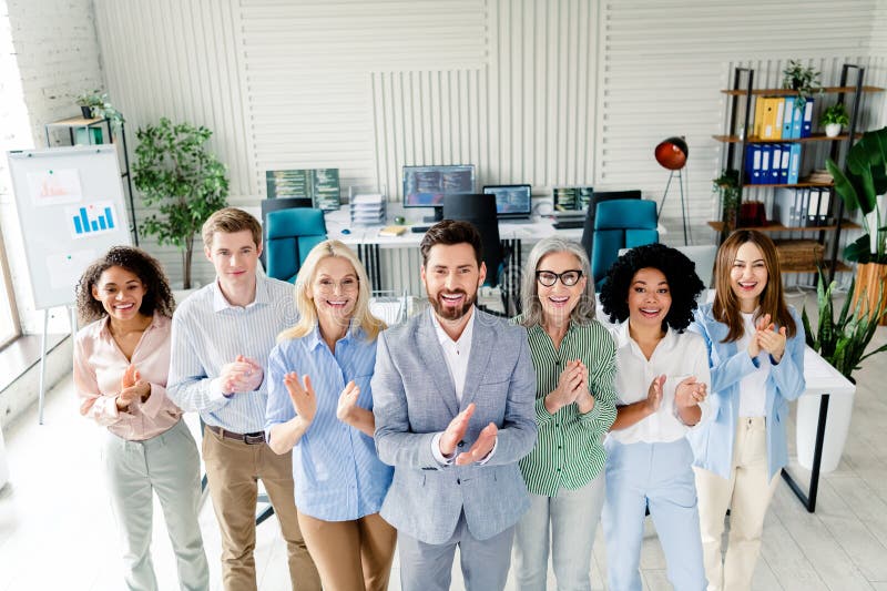 Diverse Group of Professionals Clapping in Appreciation Inside Modern ...