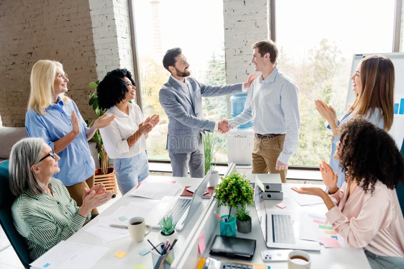 Diverse Group of Professionals Collaborating in a Modern Office Setting ...